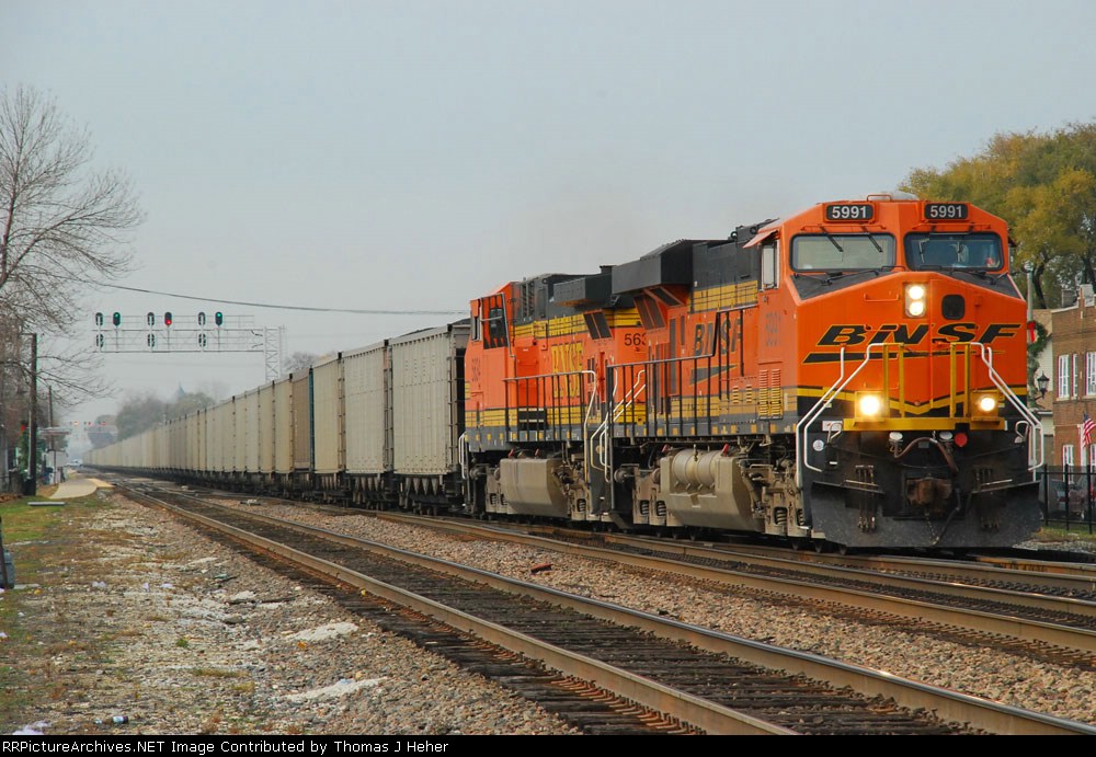 BNSF 5991 with a lo{ded BNSF hopper train headed to the CSX.